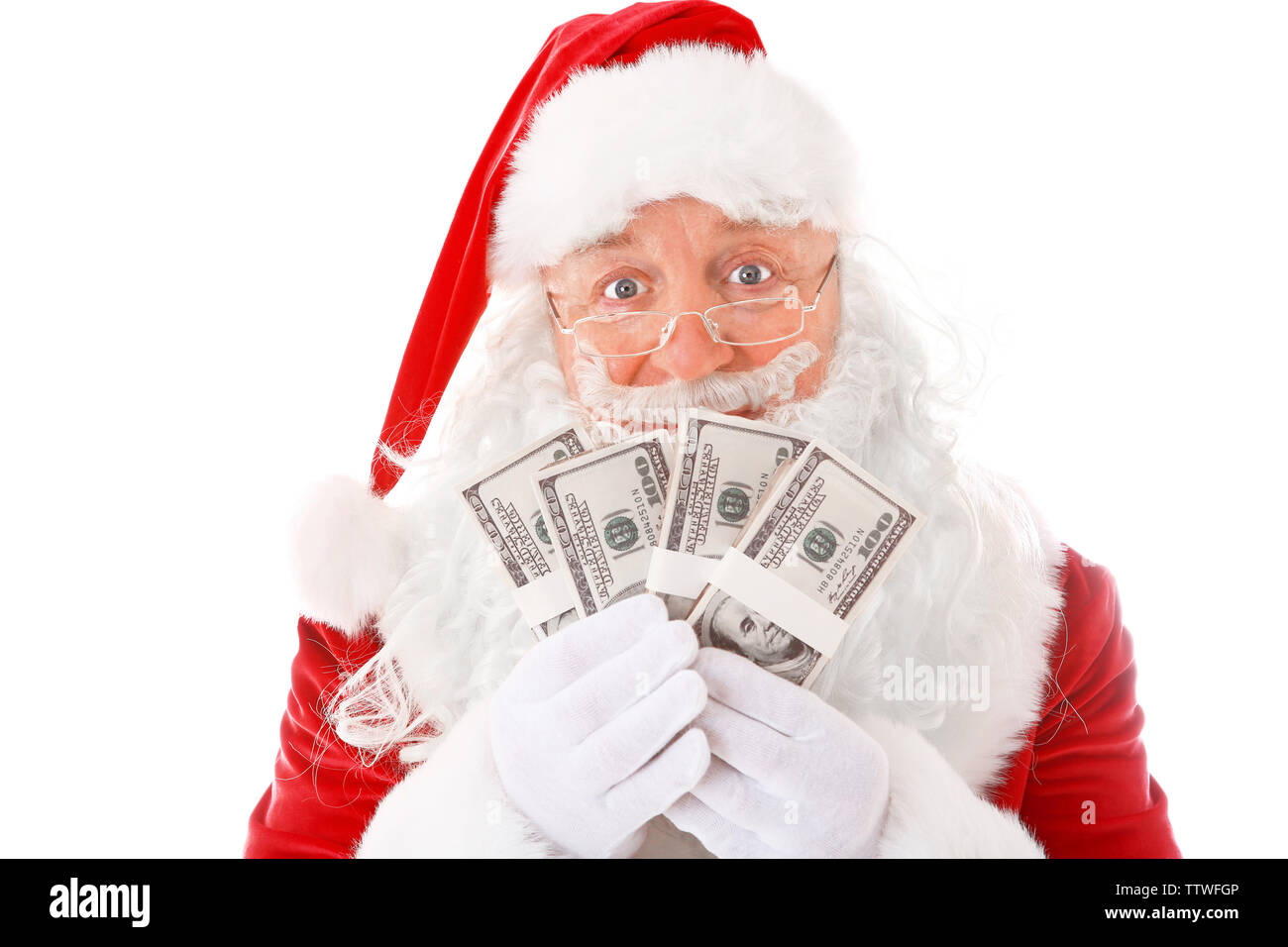 Santa Claus holding money on white background Stock Photo - Alamy
