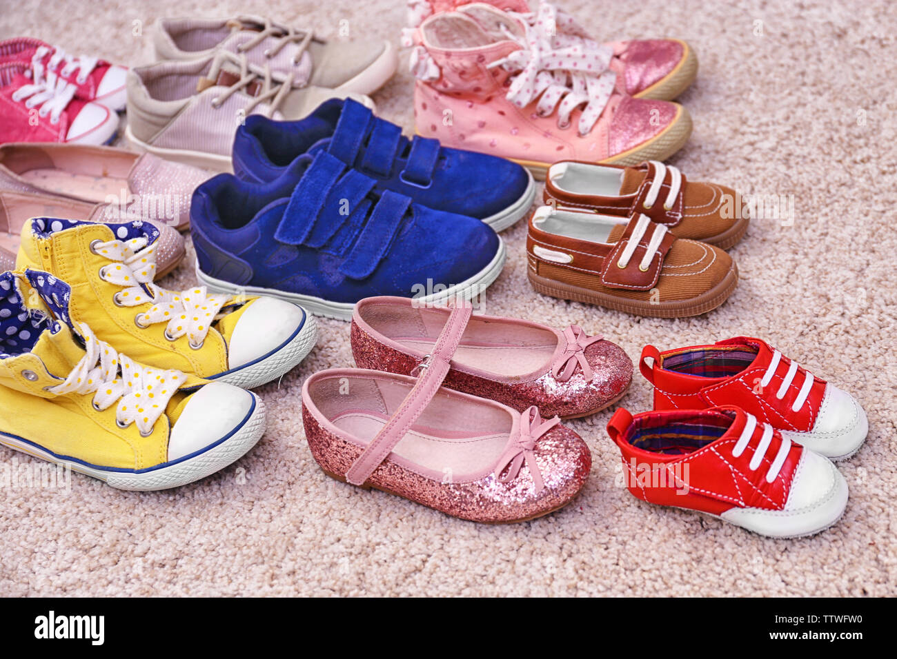 Pile of shoes kids hi-res stock photography and images - Alamy