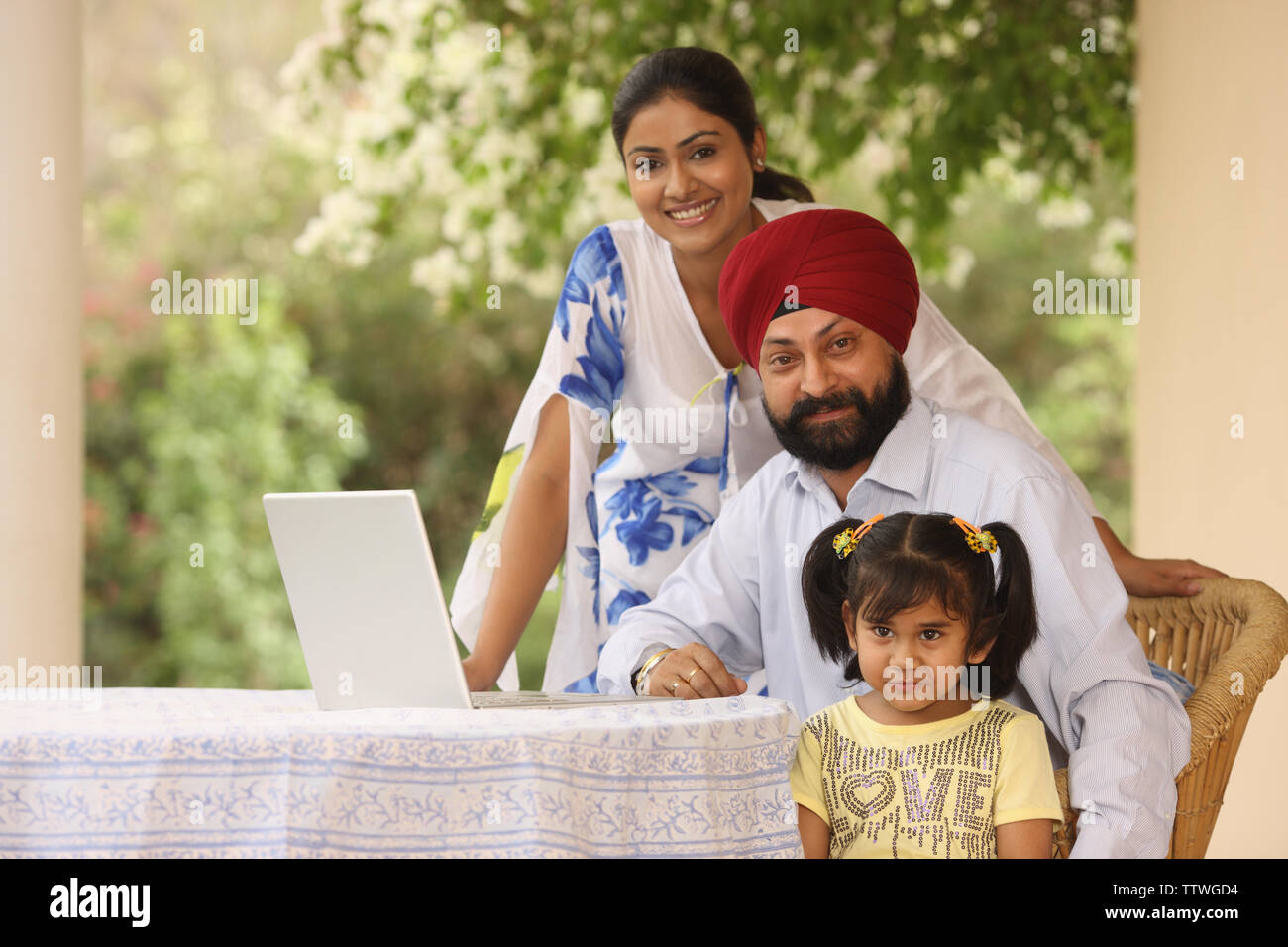 Portrait of a sardar family at a patio Stock Photo - Alamy