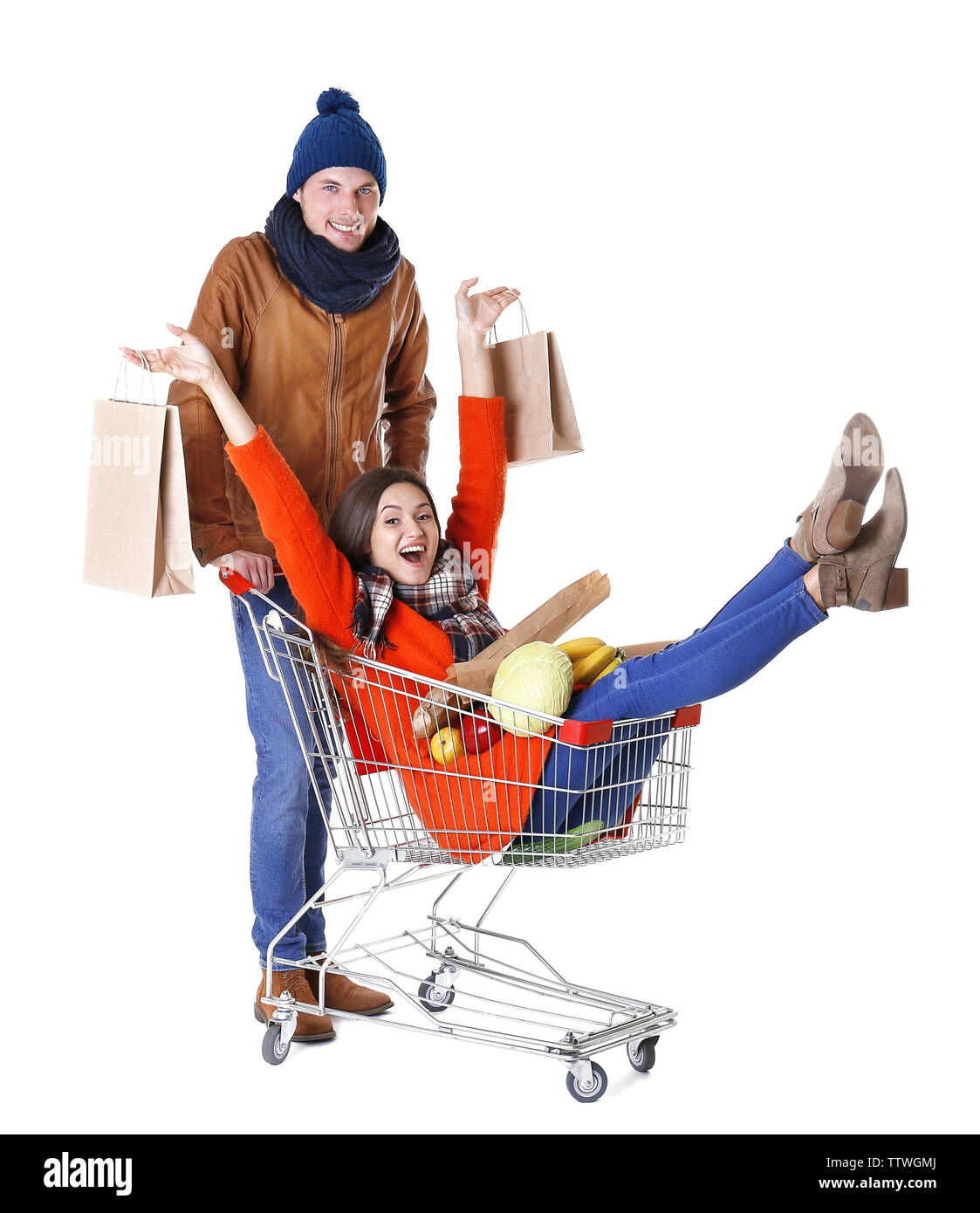 Young man carrying woman in trolley isolated on white Stock Photo - Alamy