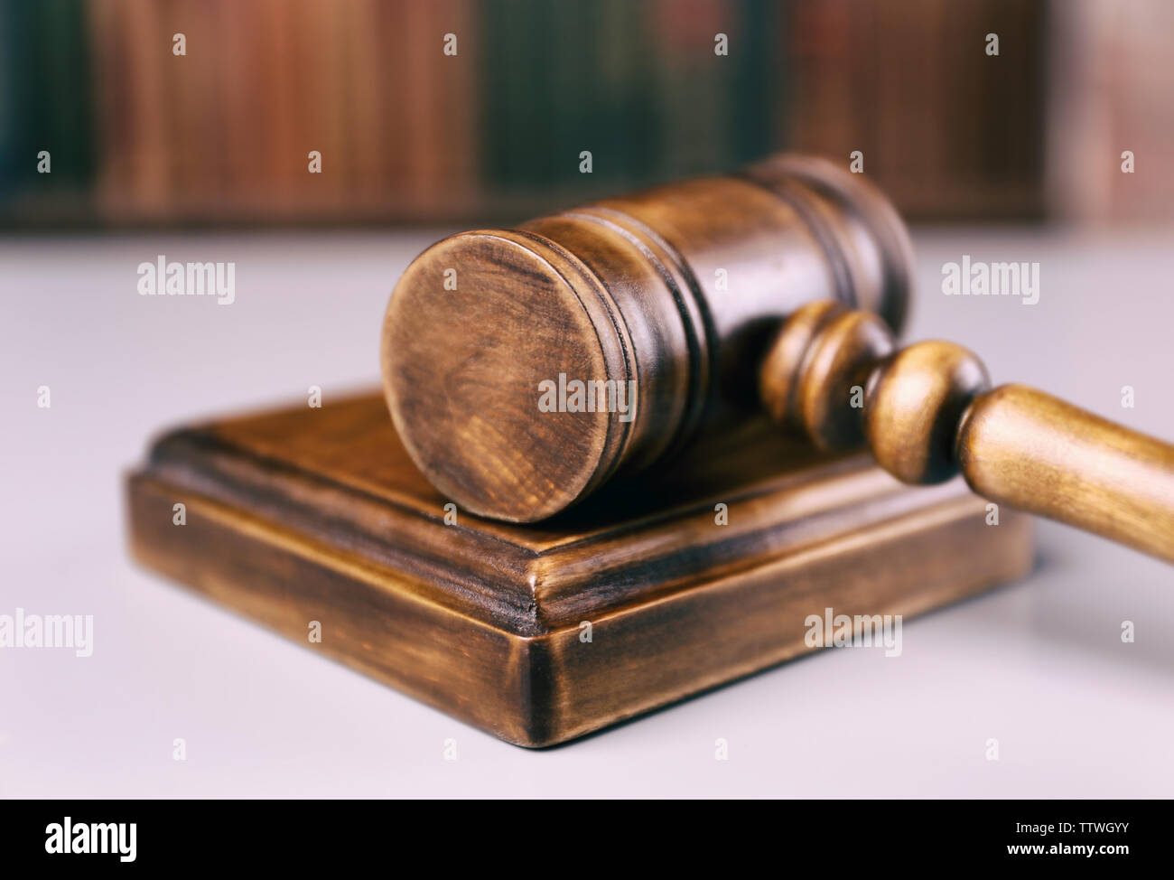 Judge gavel with sound block and books on background Stock Photo - Alamy