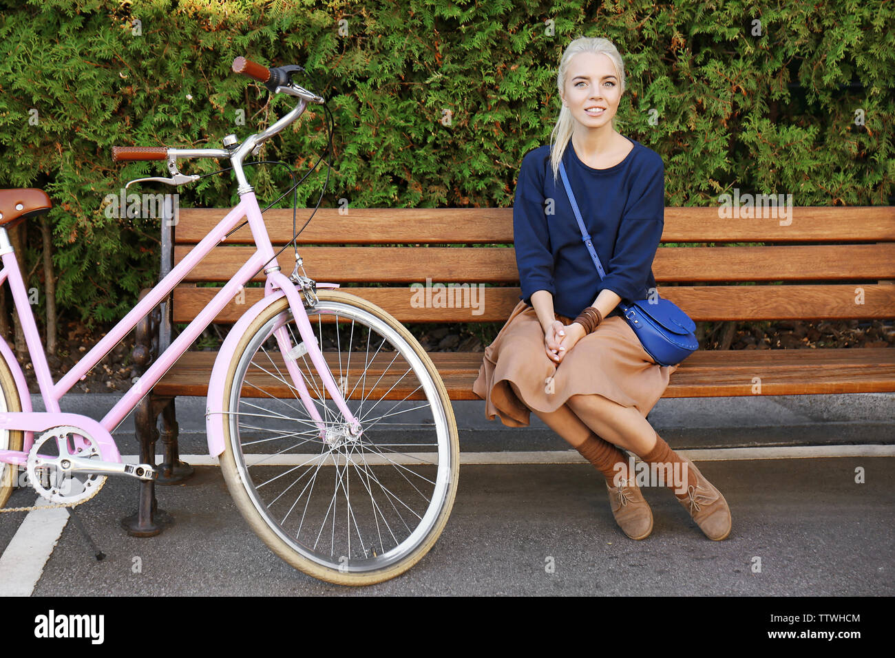 Biker sitting on bench hi-res stock photography and images - Alamy