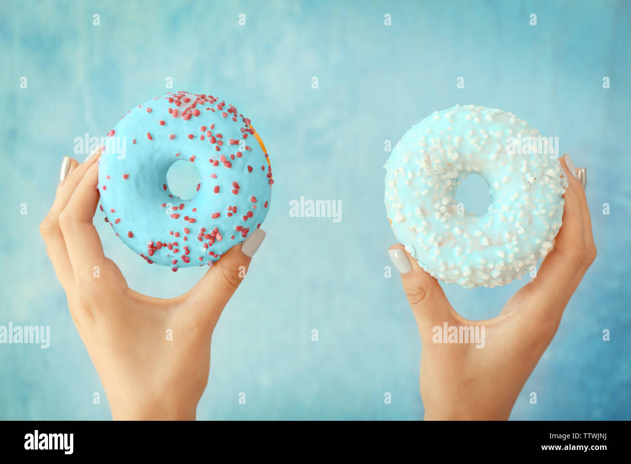 Female hands tasty donuts hi-res stock photography and images - Alamy