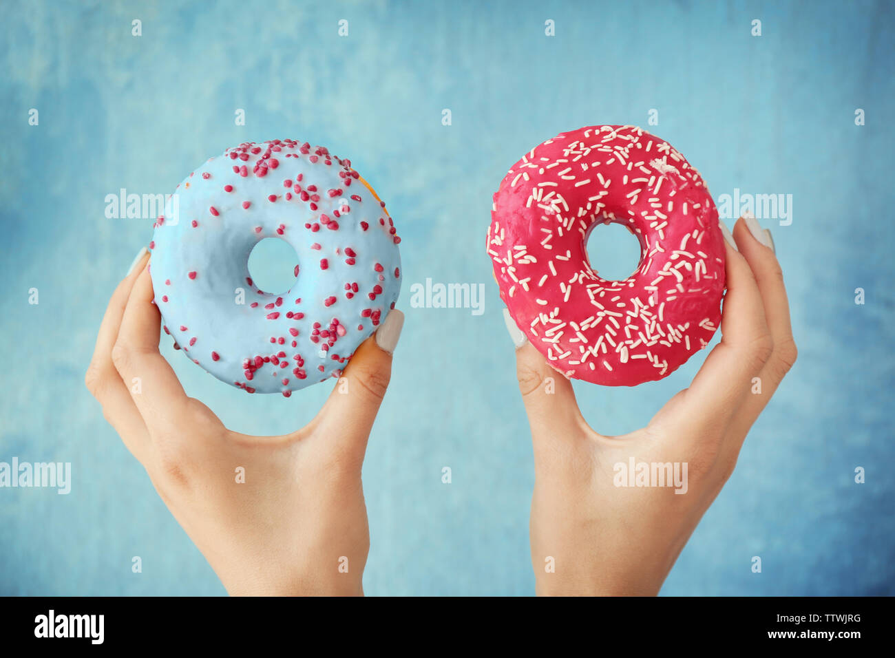 Female hands tasty donuts hi-res stock photography and images - Alamy