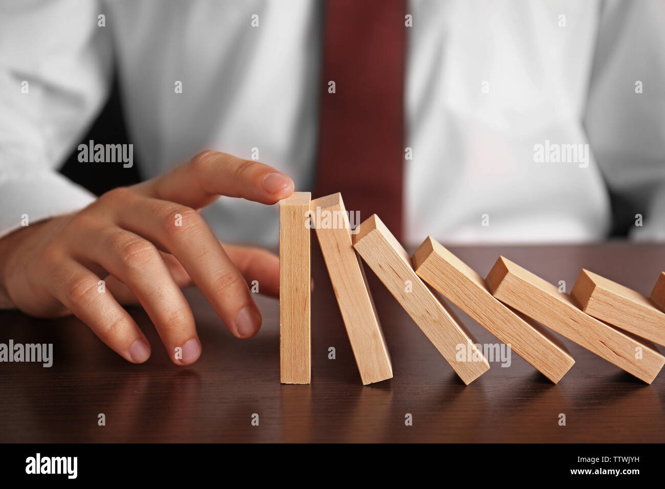 Toppling blocks hi-res stock photography and images - Alamy