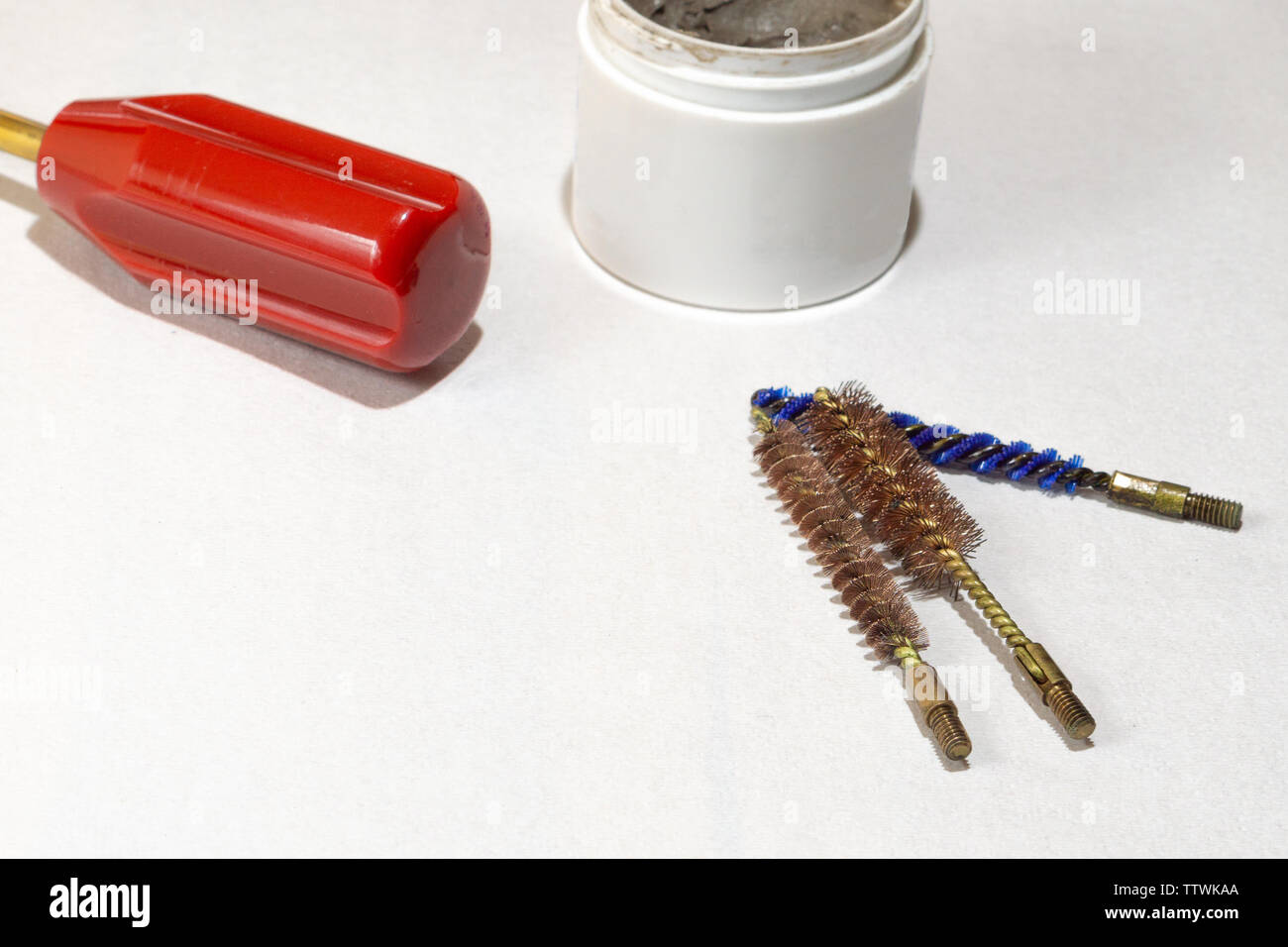 Bore brush, coated rods and bore cleaning compounde on white ...