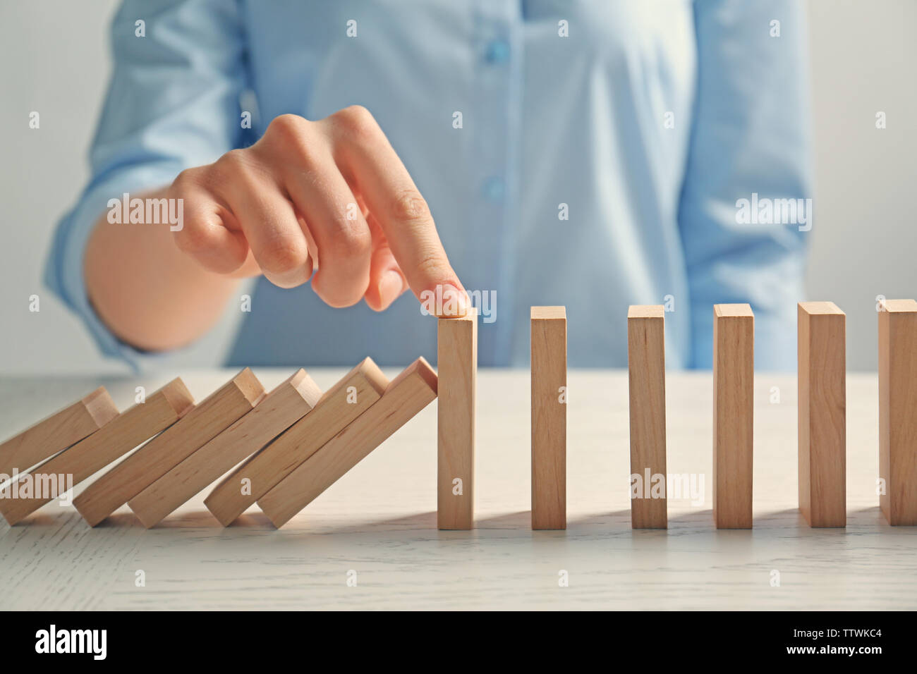 Toppling blocks hi-res stock photography and images - Alamy