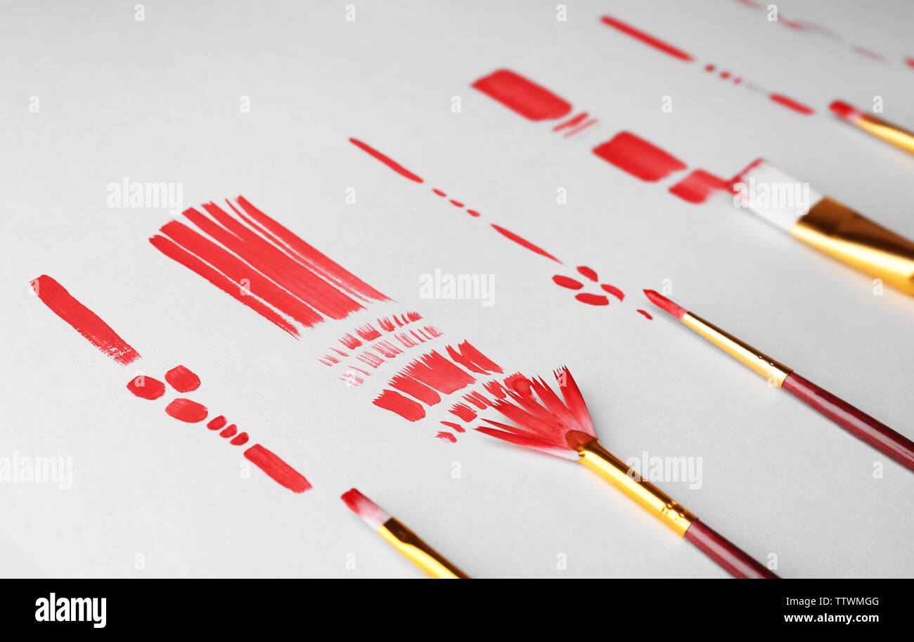 Make up brushes with smear on white background Stock Photo - Alamy