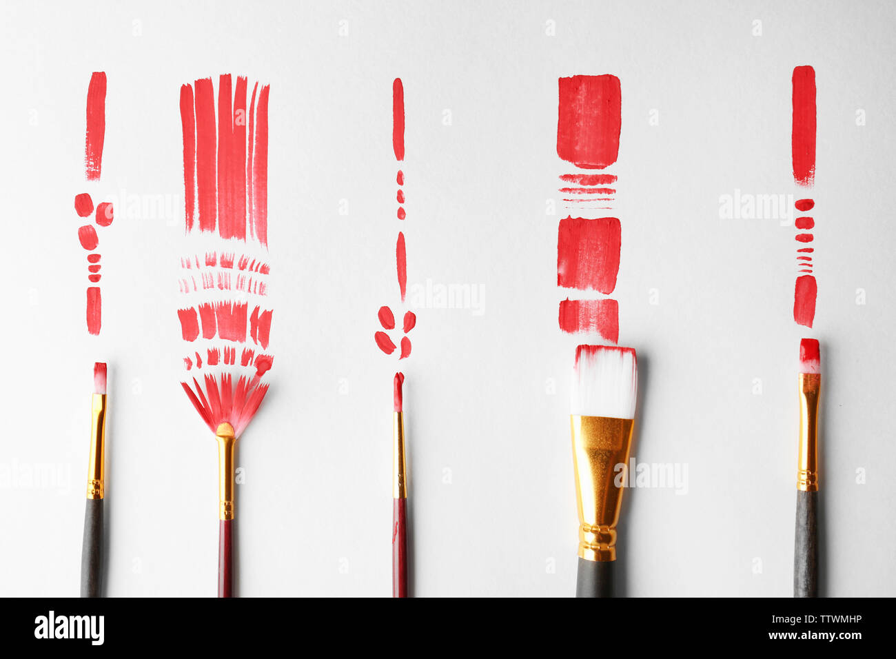 Make up brushes with smear on white background Stock Photo - Alamy