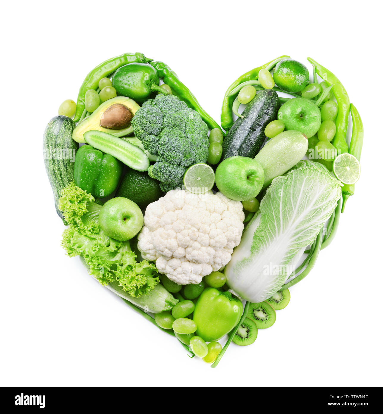 Green vegetables and fruits in shape of heart Stock Photo - Alamy