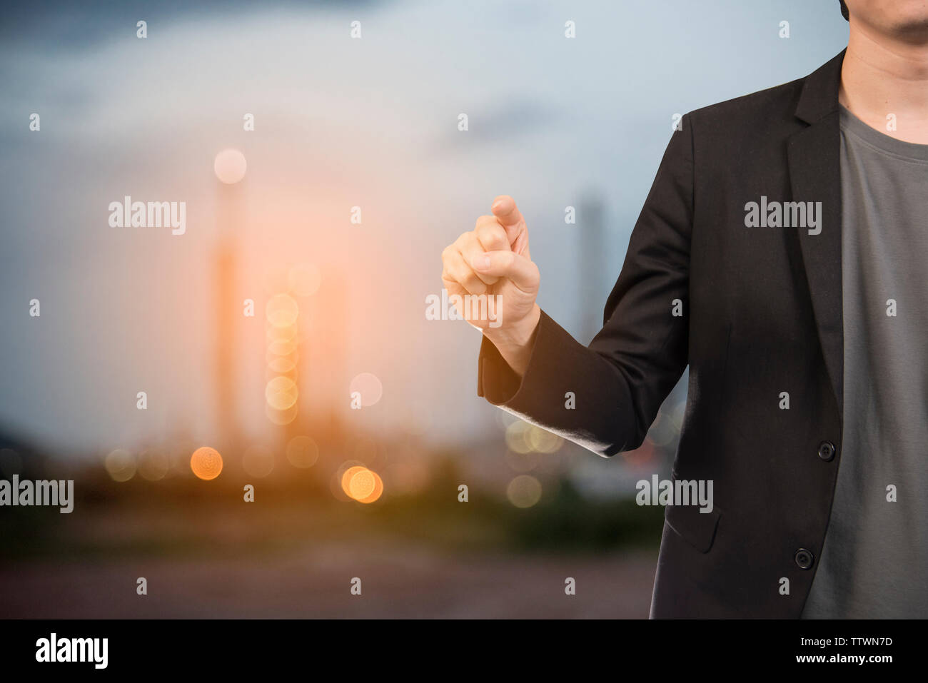 Business man at a refinery Stock Photo - Alamy
