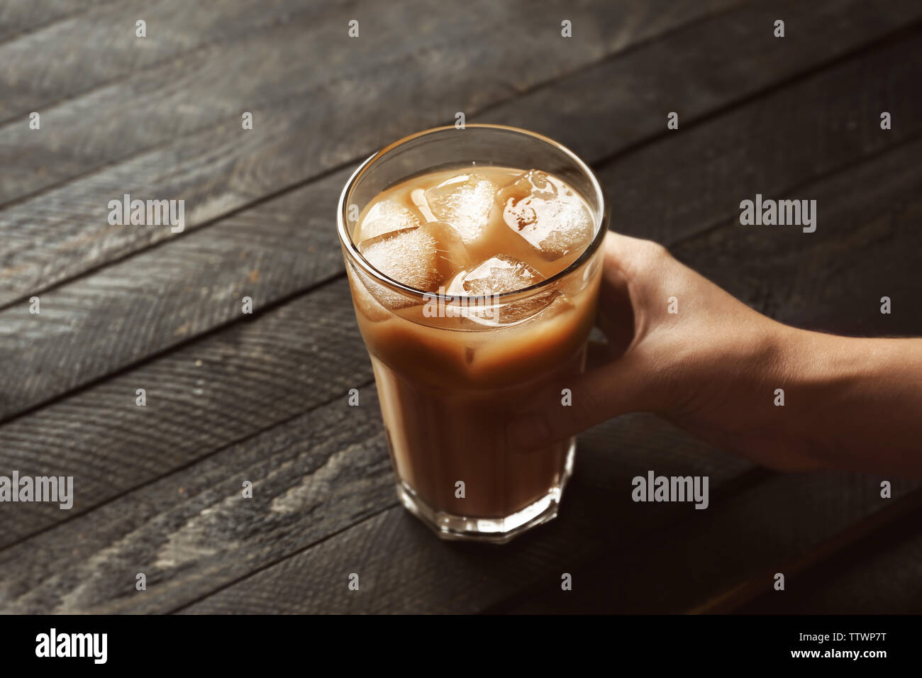 Female hand holding iced coffee hi-res stock photography and images - Alamy
