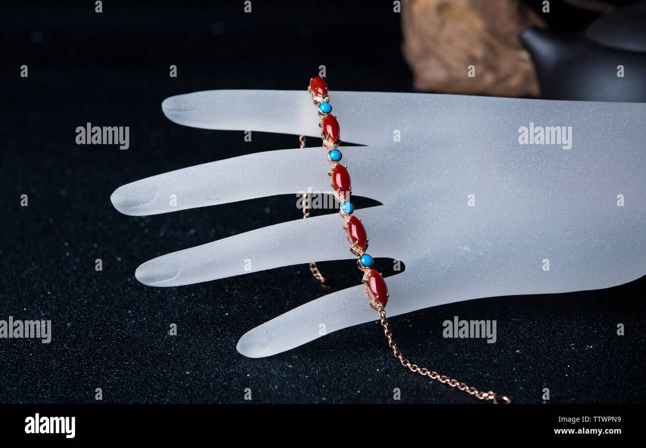 Red coral bracelets hi-res stock photography and images - Alamy