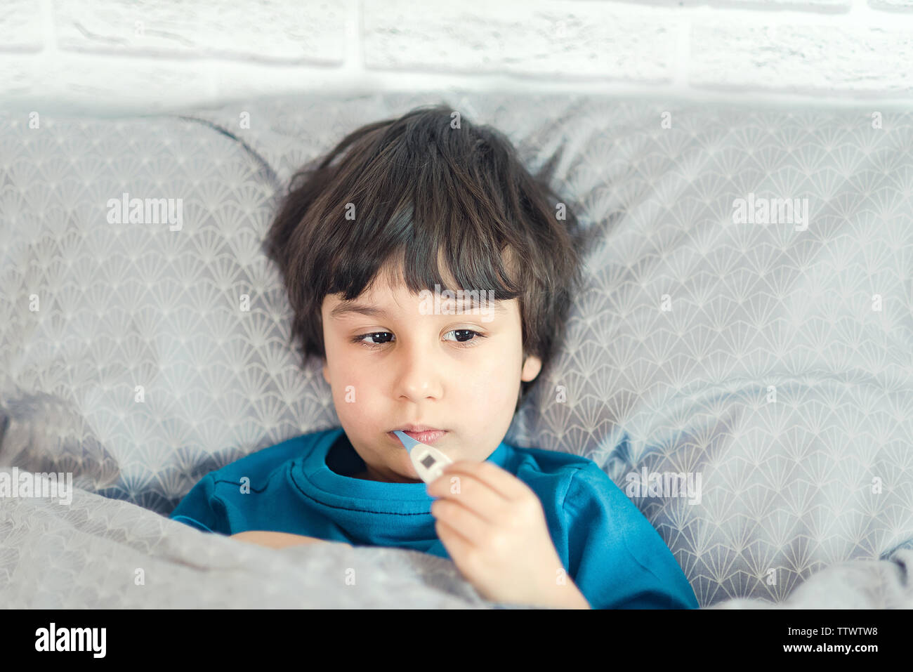 Child flu sick, boy with medical thermometer in mouth, health illness ...