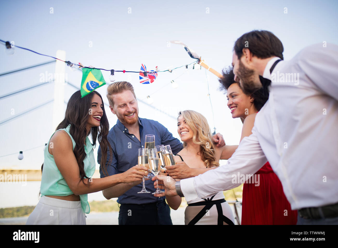 Group of happy people or friends having fun at party Stock Photo - Alamy