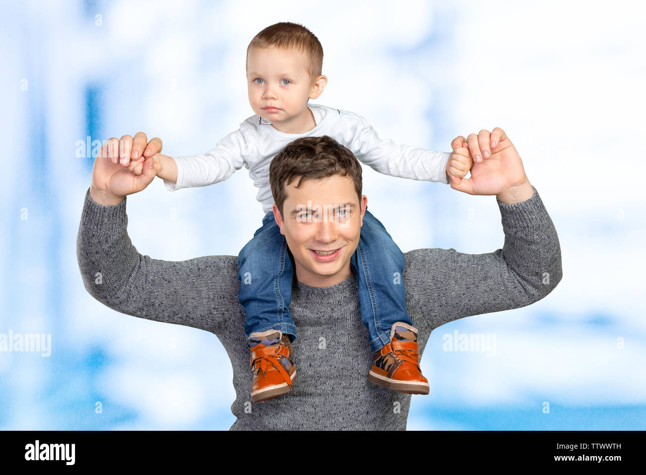 Happy father holding his little son Stock Photo - Alamy