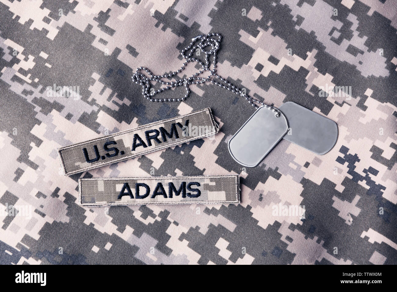 Military ID tag on uniform background Stock Photo - Alamy
