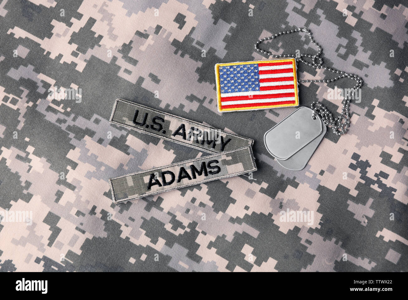 Military ID tags with USA flag on uniform background Stock Photo - Alamy