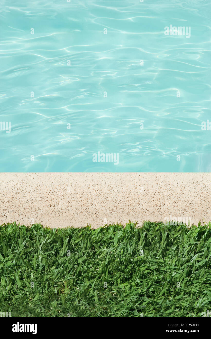 Grass on the poolside Stock Photo - Alamy