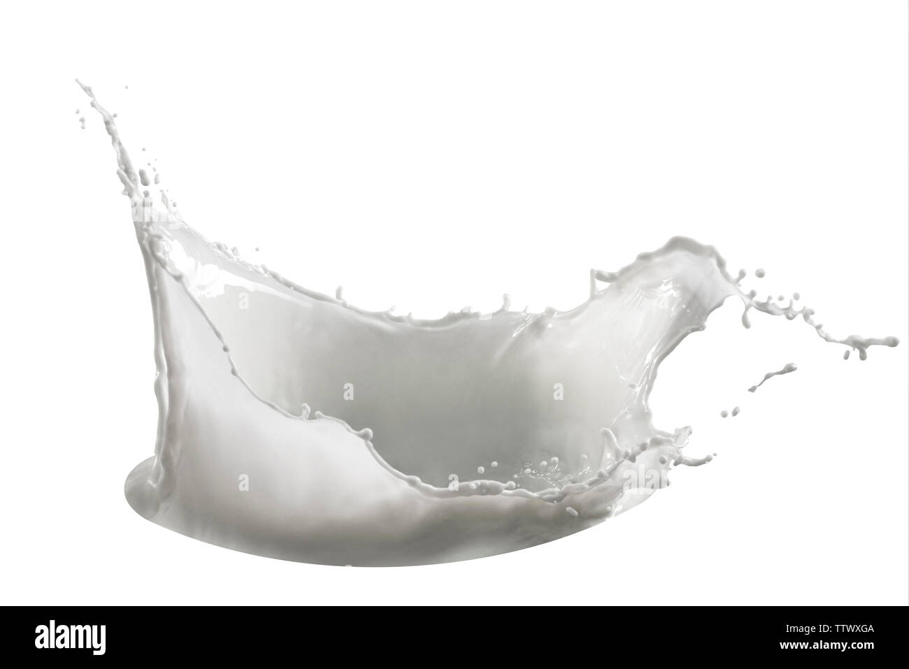 pourin milk splash isolated on white background Stock Photo - Alamy