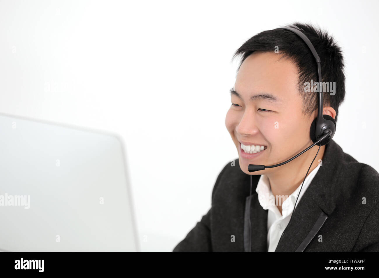 Call center operator in office Stock Photo - Alamy