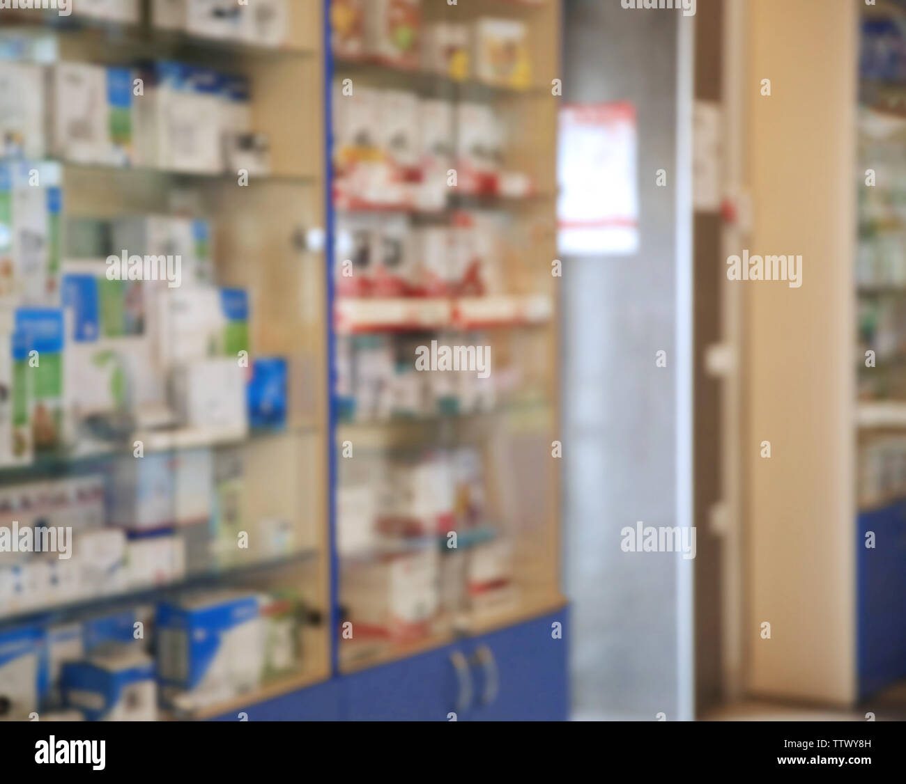 Blurred pharmacy drugstore background Stock Photo - Alamy