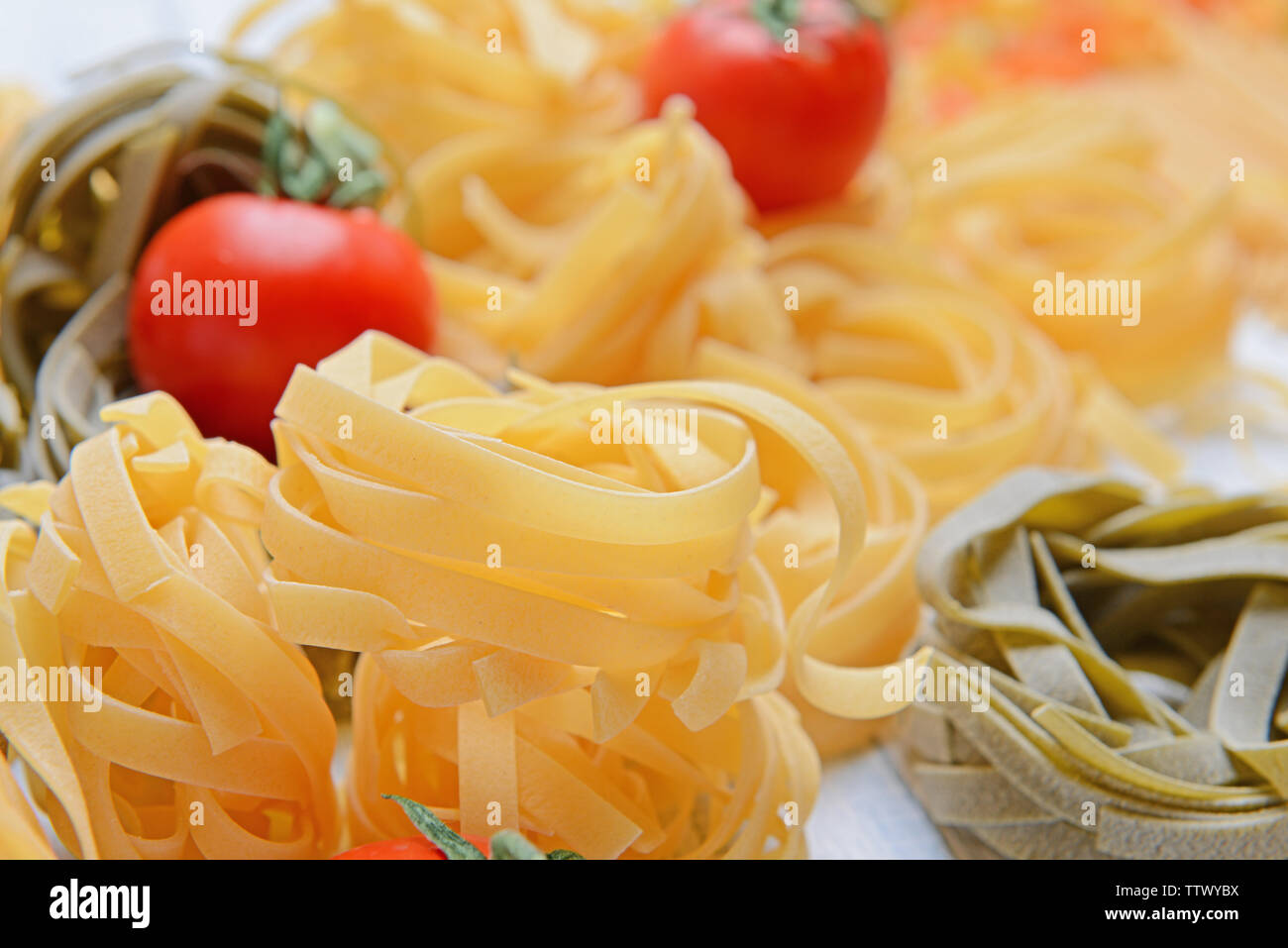 Different kinds of dry pasta, close up Stock Photo - Alamy