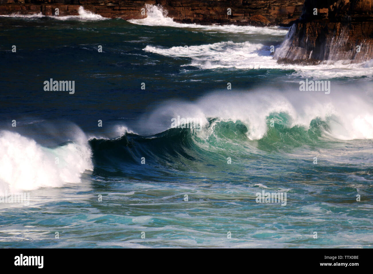 Turbulent impact on the beach hi-res stock photography and images - Alamy