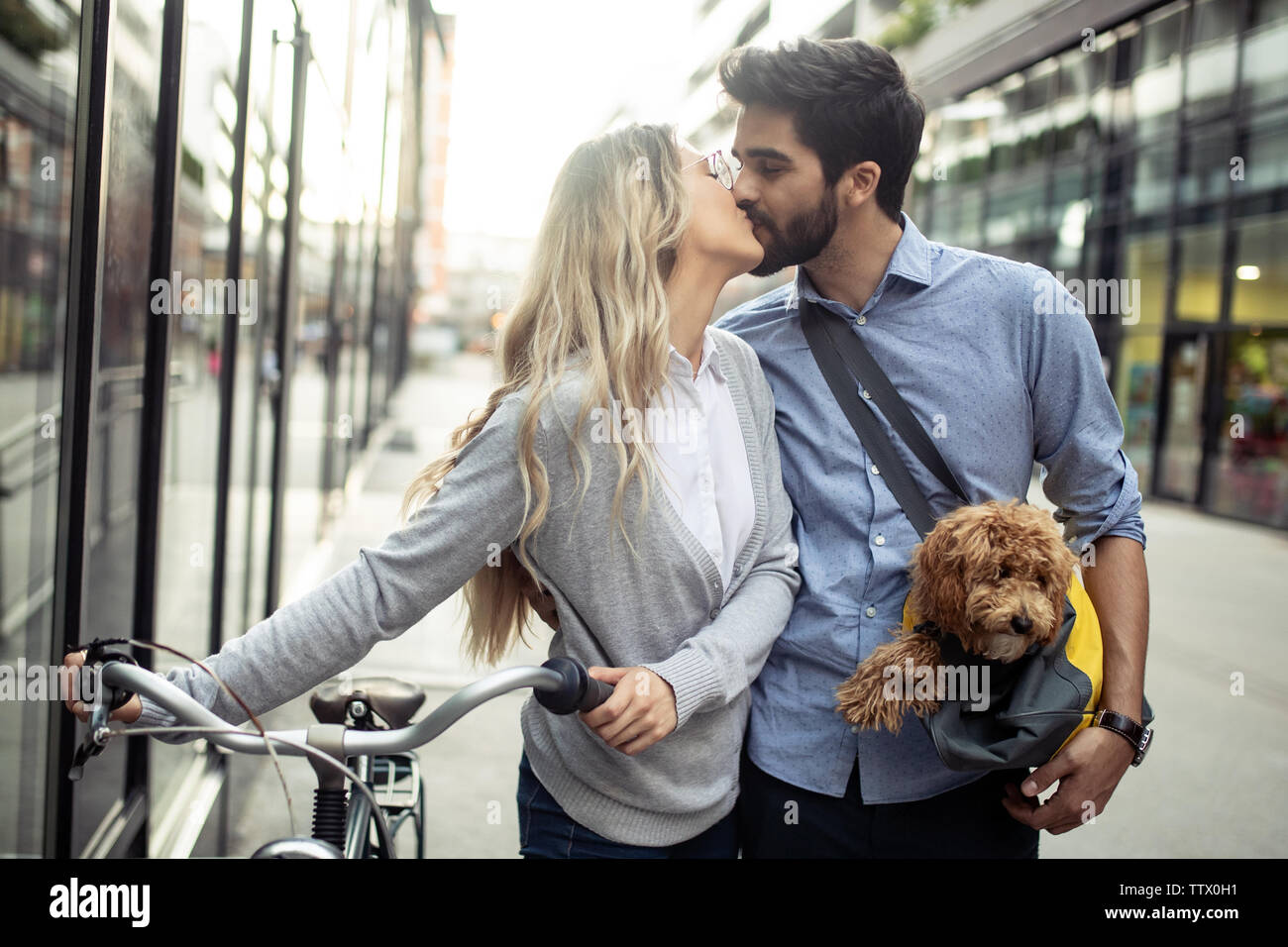 Happy couple dating on sunny day in the city Stock Photo - Alamy