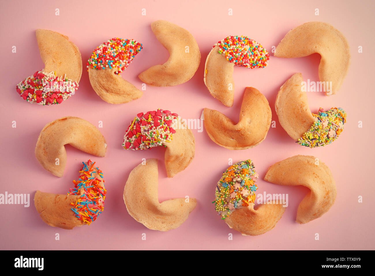 Fortune cookies on color background Stock Photo - Alamy