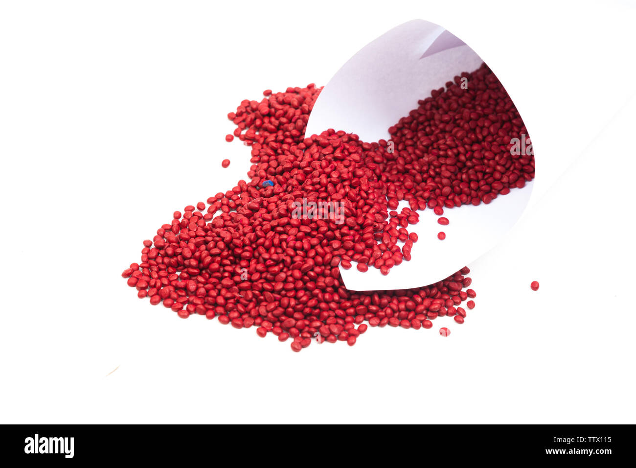 red polymer balls for injection moulding process Stock Photo - Alamy