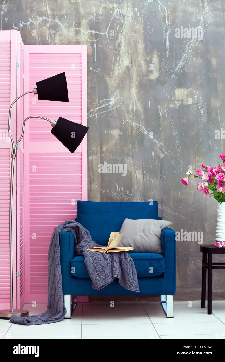 Modern room interior with pink wooden screen Stock Photo - Alamy