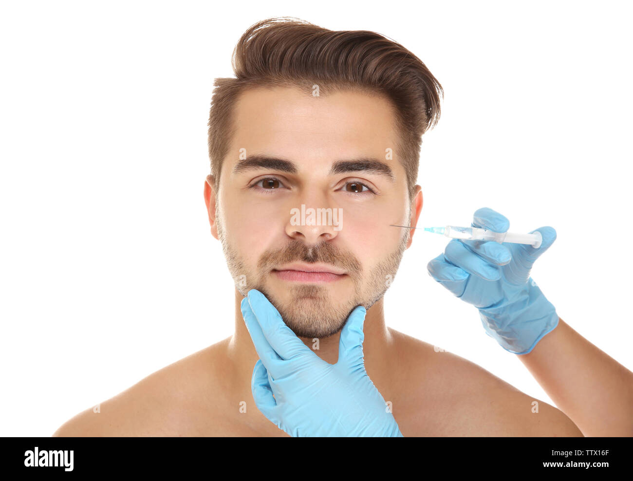 Plastic surgery concept. Man receiving injection in his face Stock ...