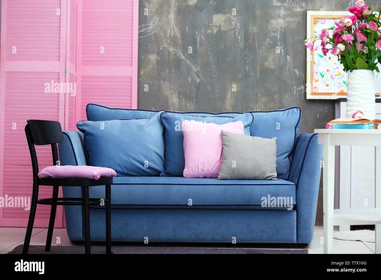 Modern room interior with pink wooden screen Stock Photo - Alamy