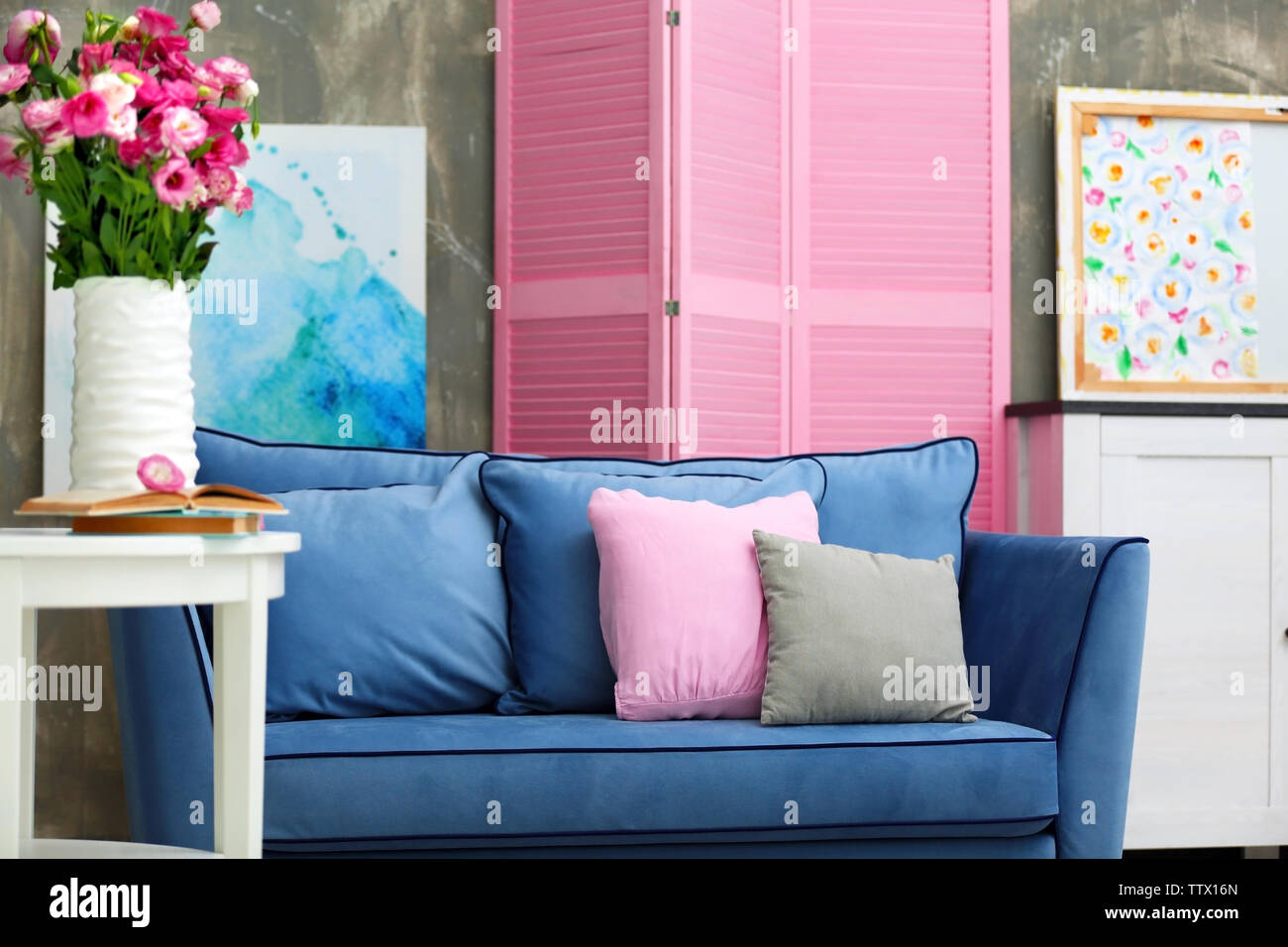 Modern room interior with pink wooden screen Stock Photo - Alamy