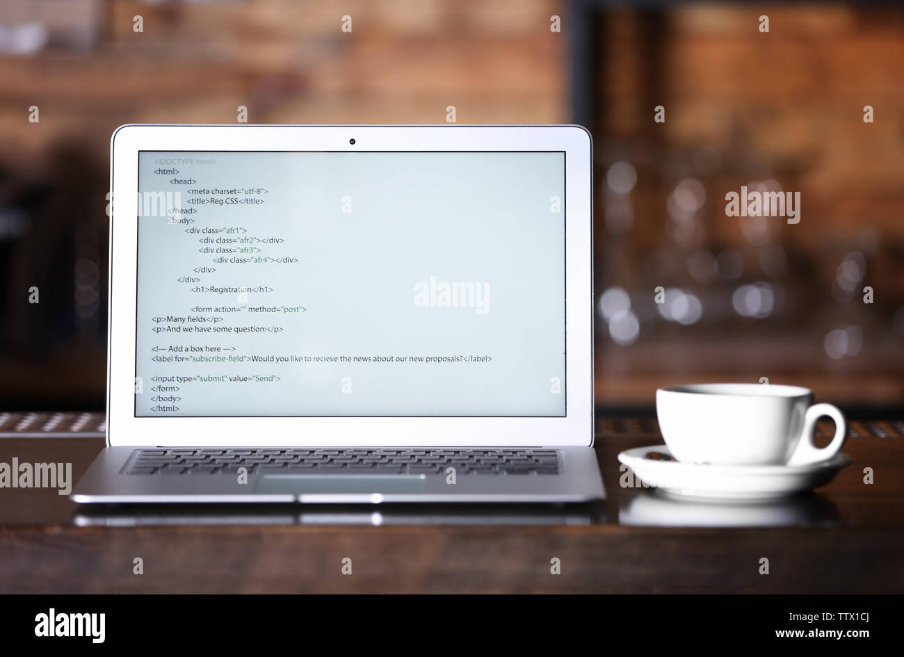 Modern laptop in cafe Stock Photo - Alamy