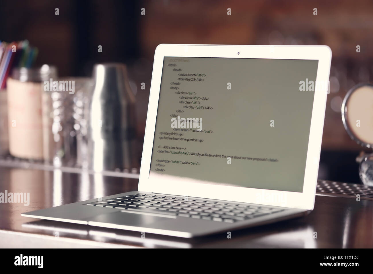 Modern laptop in cafe Stock Photo - Alamy