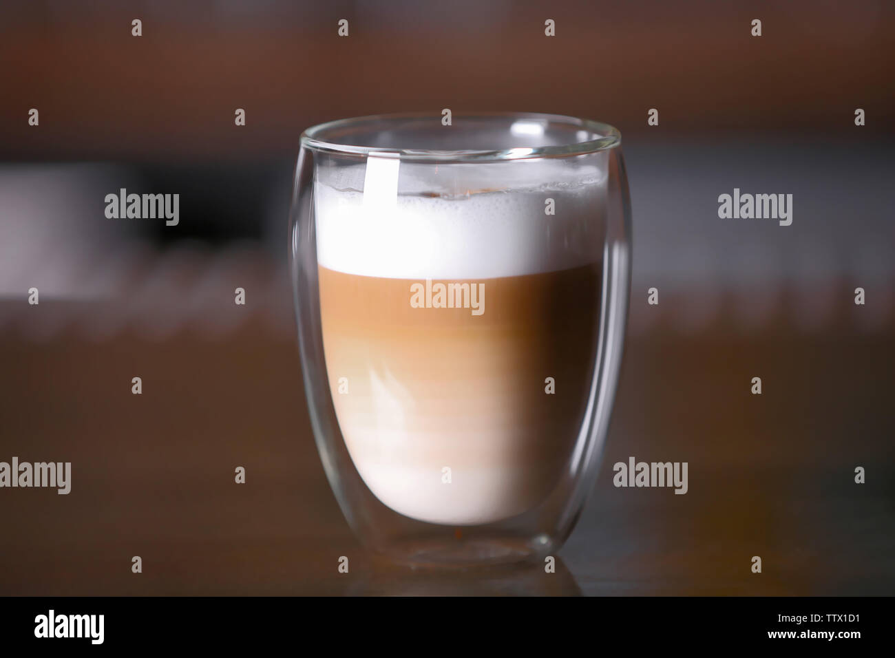 Cup of hot coffee in cafe Stock Photo - Alamy