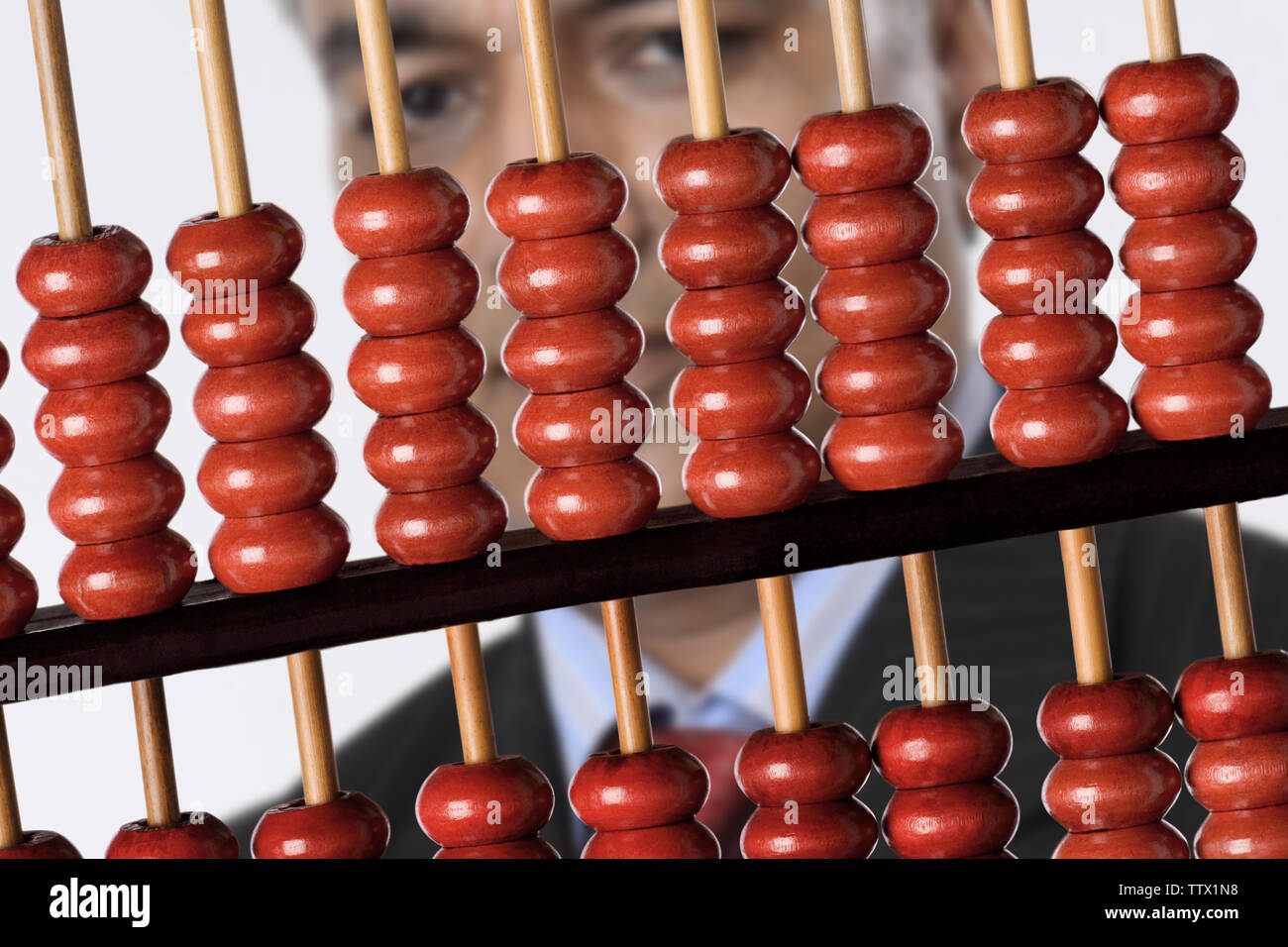 Business man calculating machine hi-res stock photography and images ...