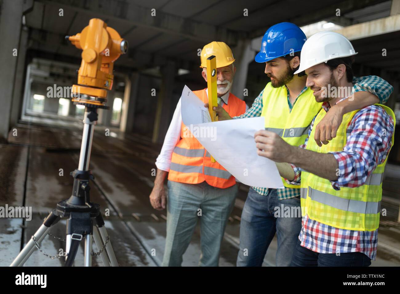 Group of construction engineer working in construction site Stock Photo ...