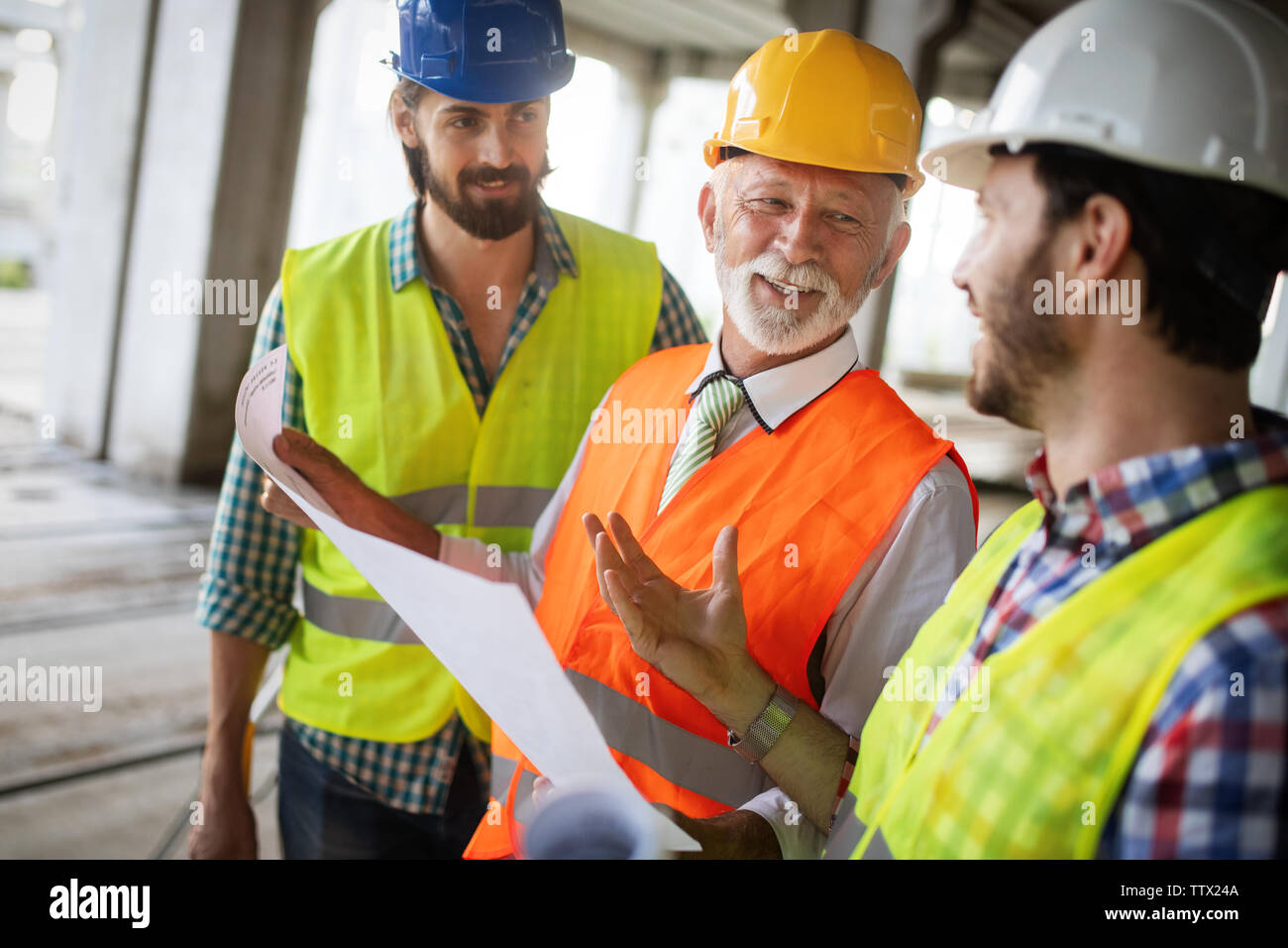Group of construction engineer working in construction site Stock Photo ...