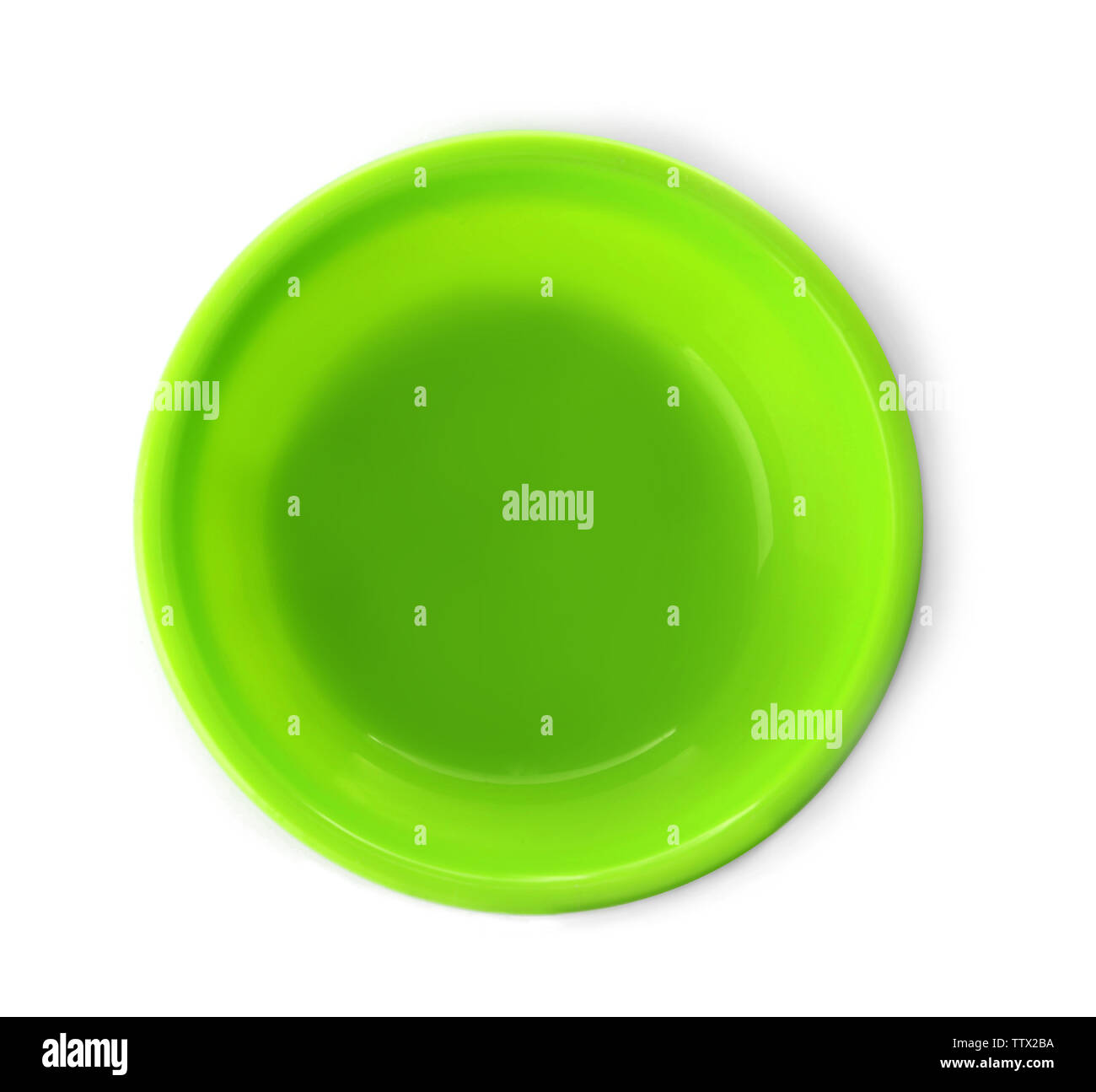 Bright plastic plate for child on white background Stock Photo - Alamy