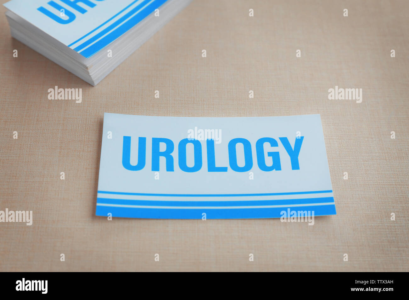 Cards with word UROLOGY on light background Stock Photo - Alamy