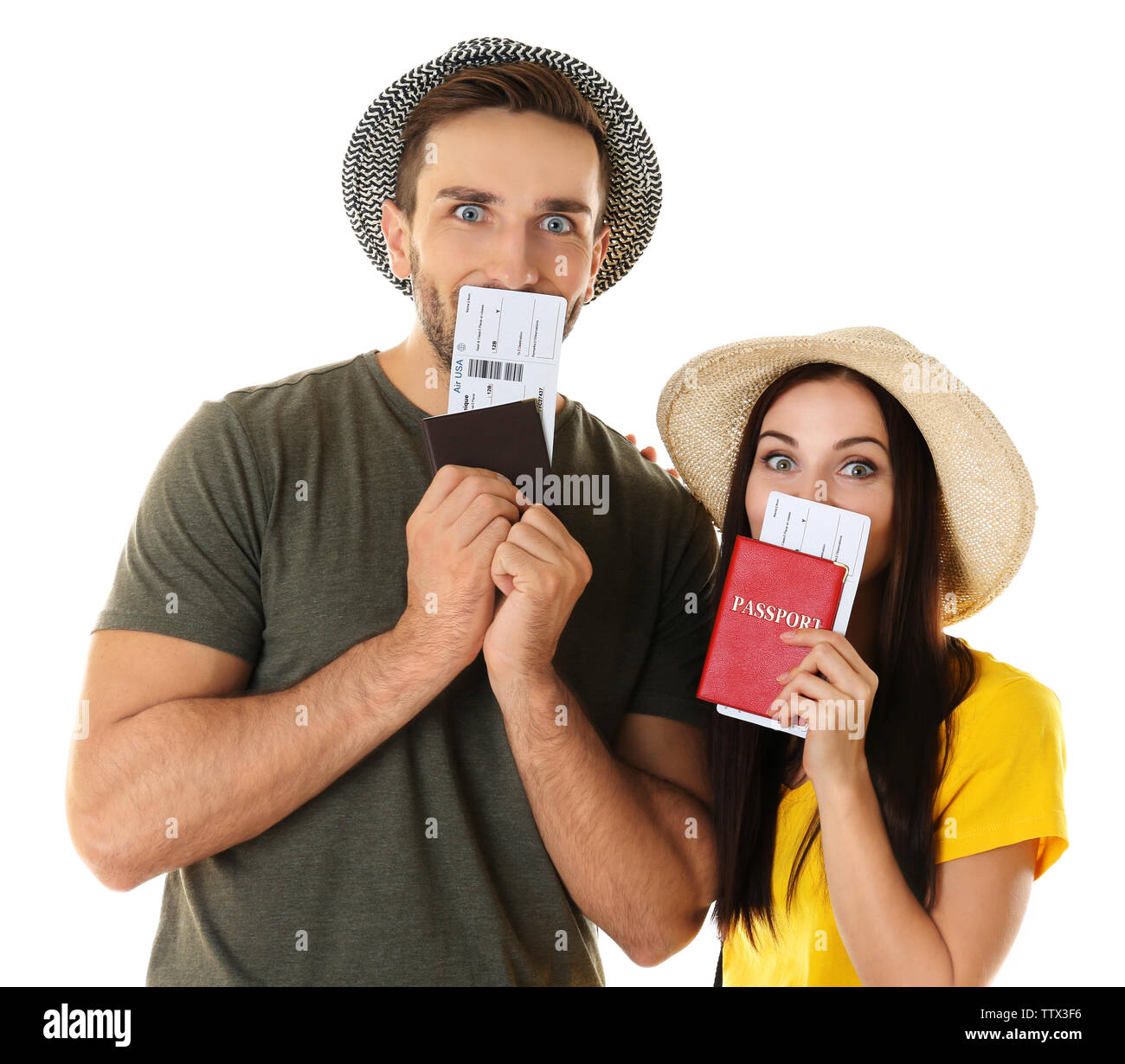 Happy couple with tickets and passports on white background Stock Photo ...