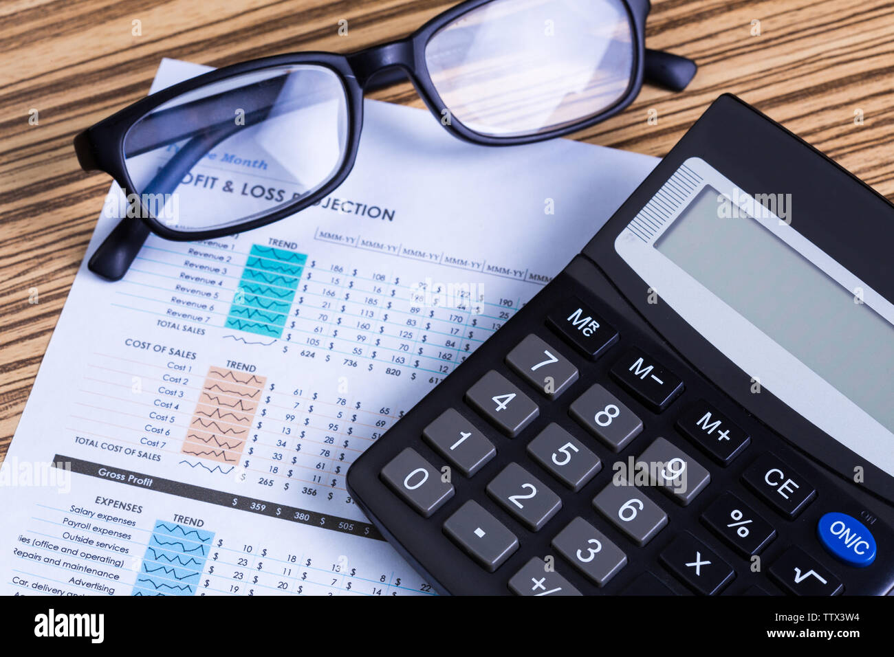 Graphs and Calculator Stock Photo - Alamy