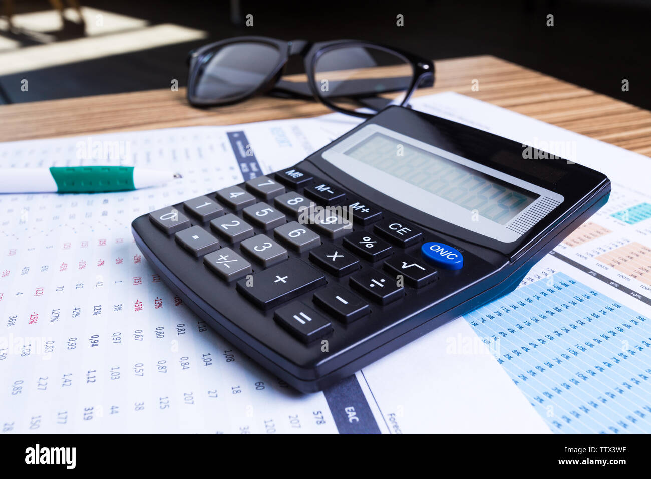 Graphs and Calculator Stock Photo - Alamy