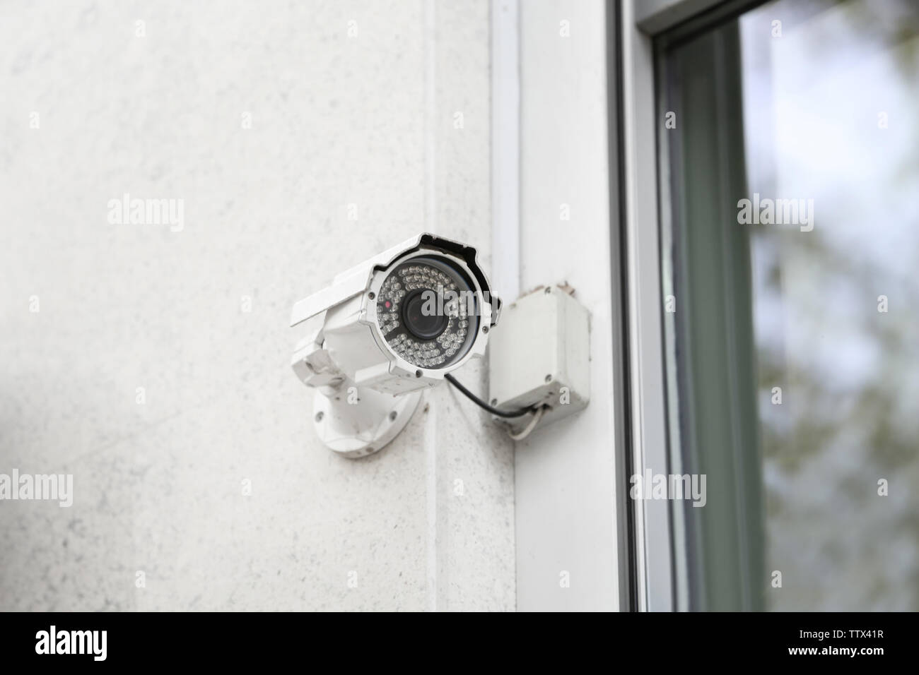 Security CCTV camera on street Stock Photo - Alamy