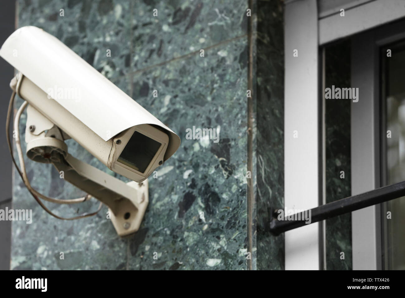 Security CCTV camera on street Stock Photo - Alamy