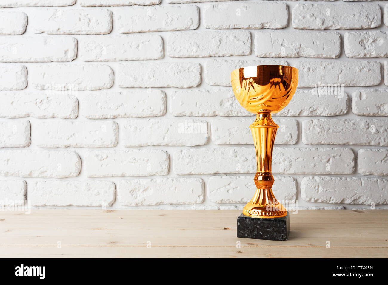 Gold trophy cup Stock Photo - Alamy