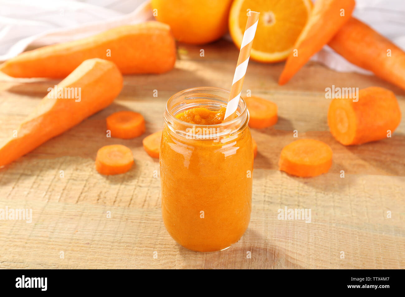 Jar with vegetable smoothie on wooden background Stock Photo - Alamy